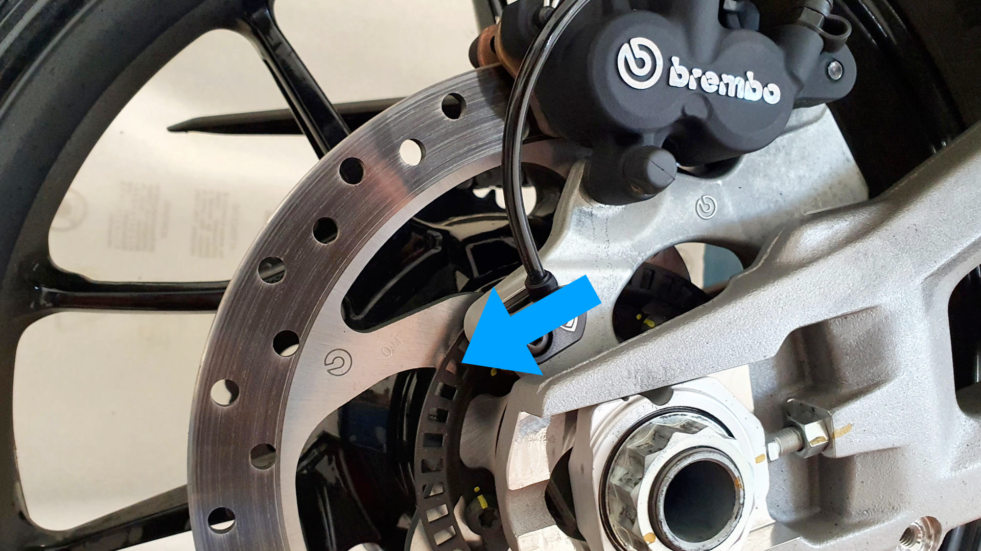 How does motorcycle traction control work?